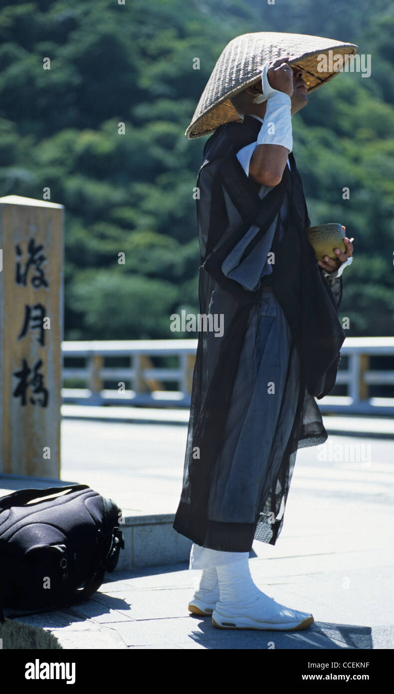 Buddhist monk begging for alms, Kyoto, Japan Stock Photo - Alamy
