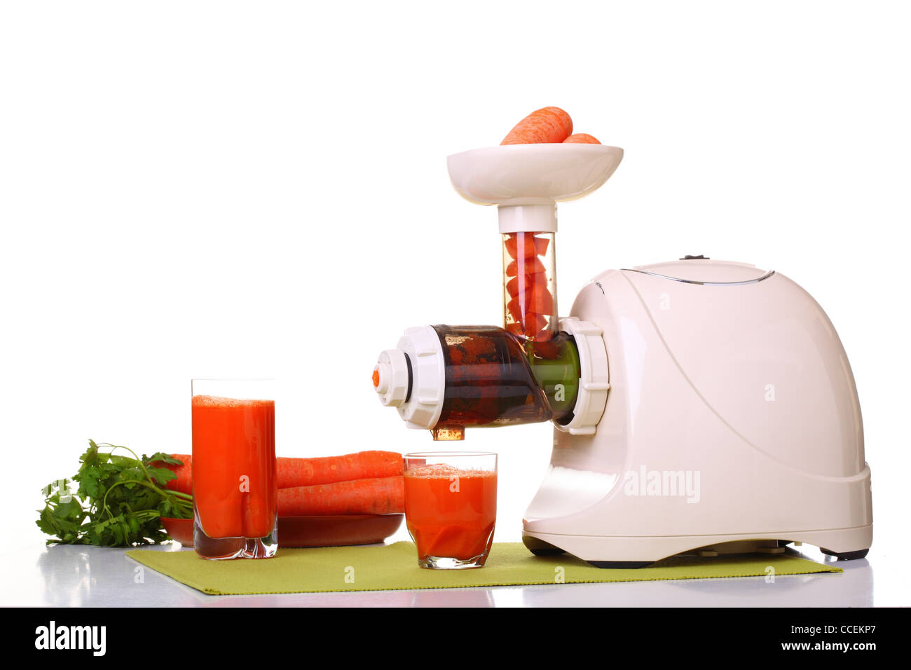 Juice extractor and carrot isolated white kitchen prepare Stock Photo ...
