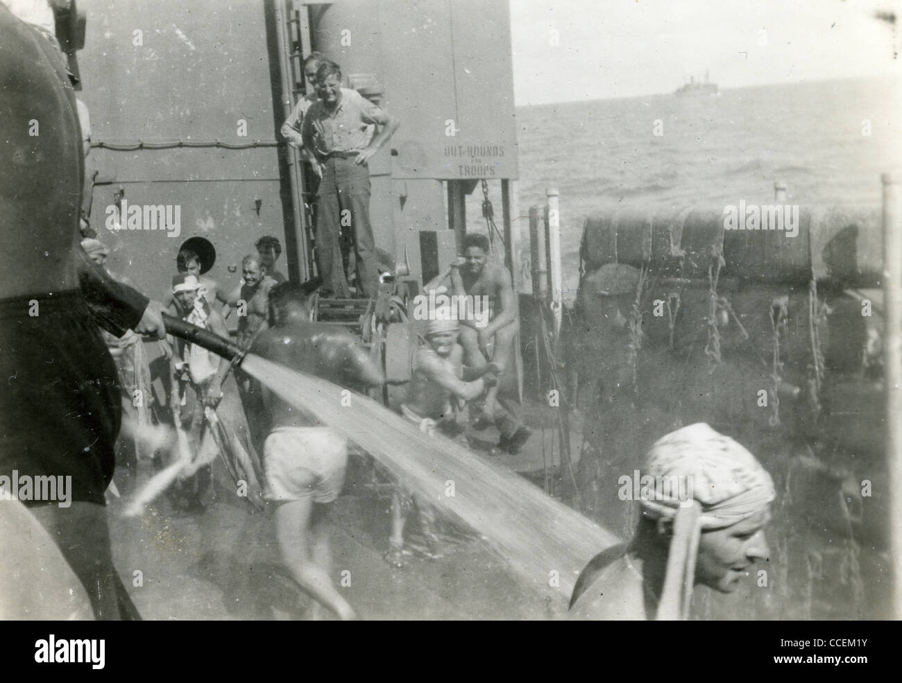 Navy man ship ceremony shellback on way to Philippines during World War ...