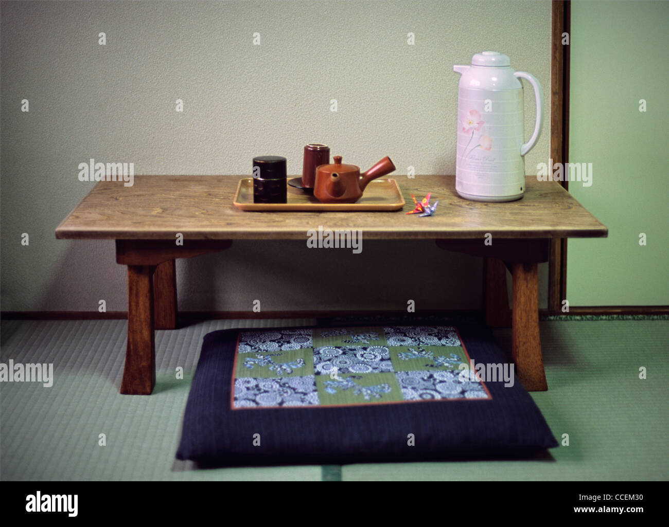 Table and cushion in a traditional Japanese inn (minshuku), Moto Hakone ...