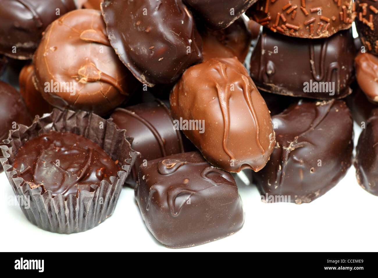 A group of dark and milk chocolate candies on white Stock Photo - Alamy