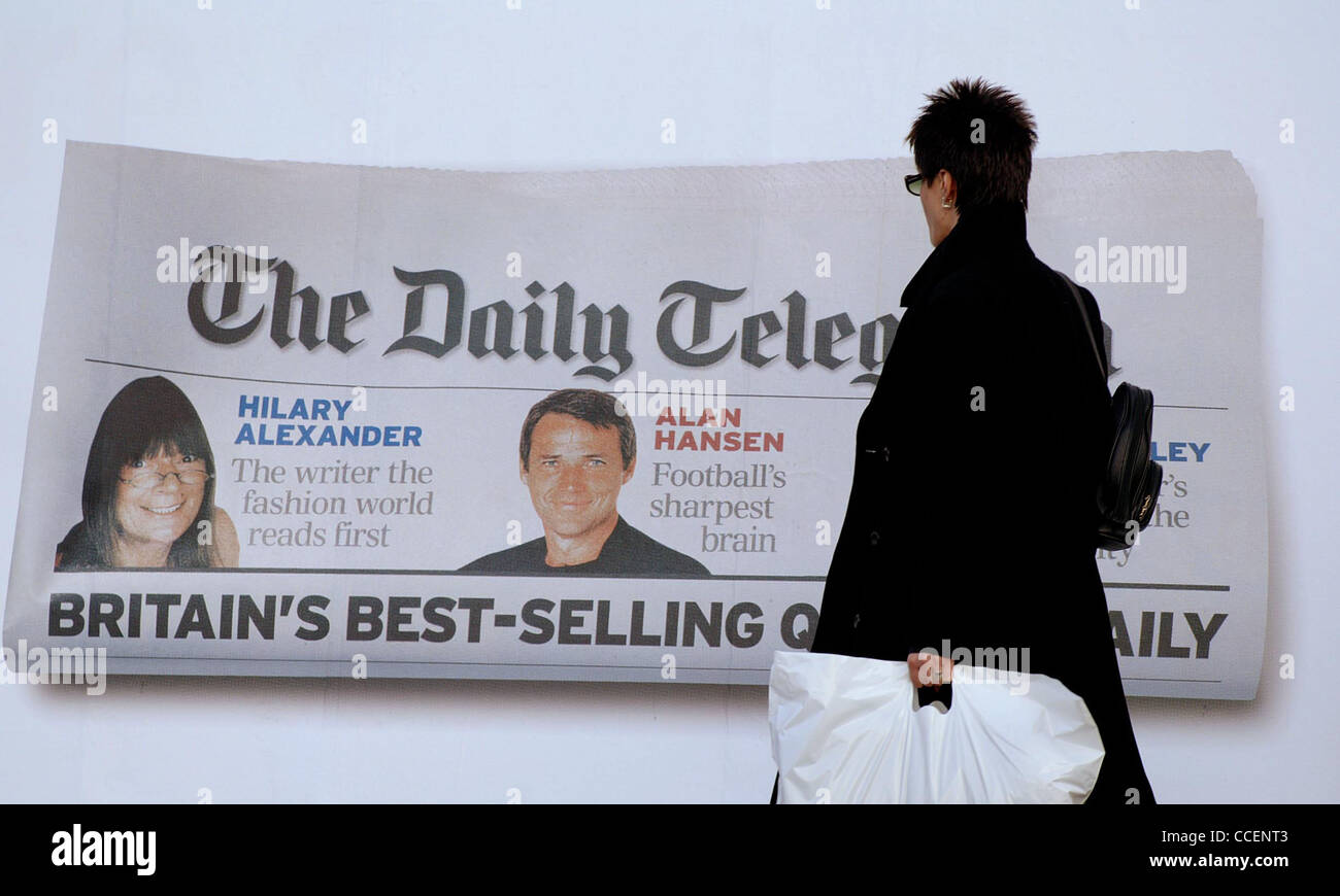 A billboard advertising The Daily Telegraph Newspaper Stock Photo - Alamy
