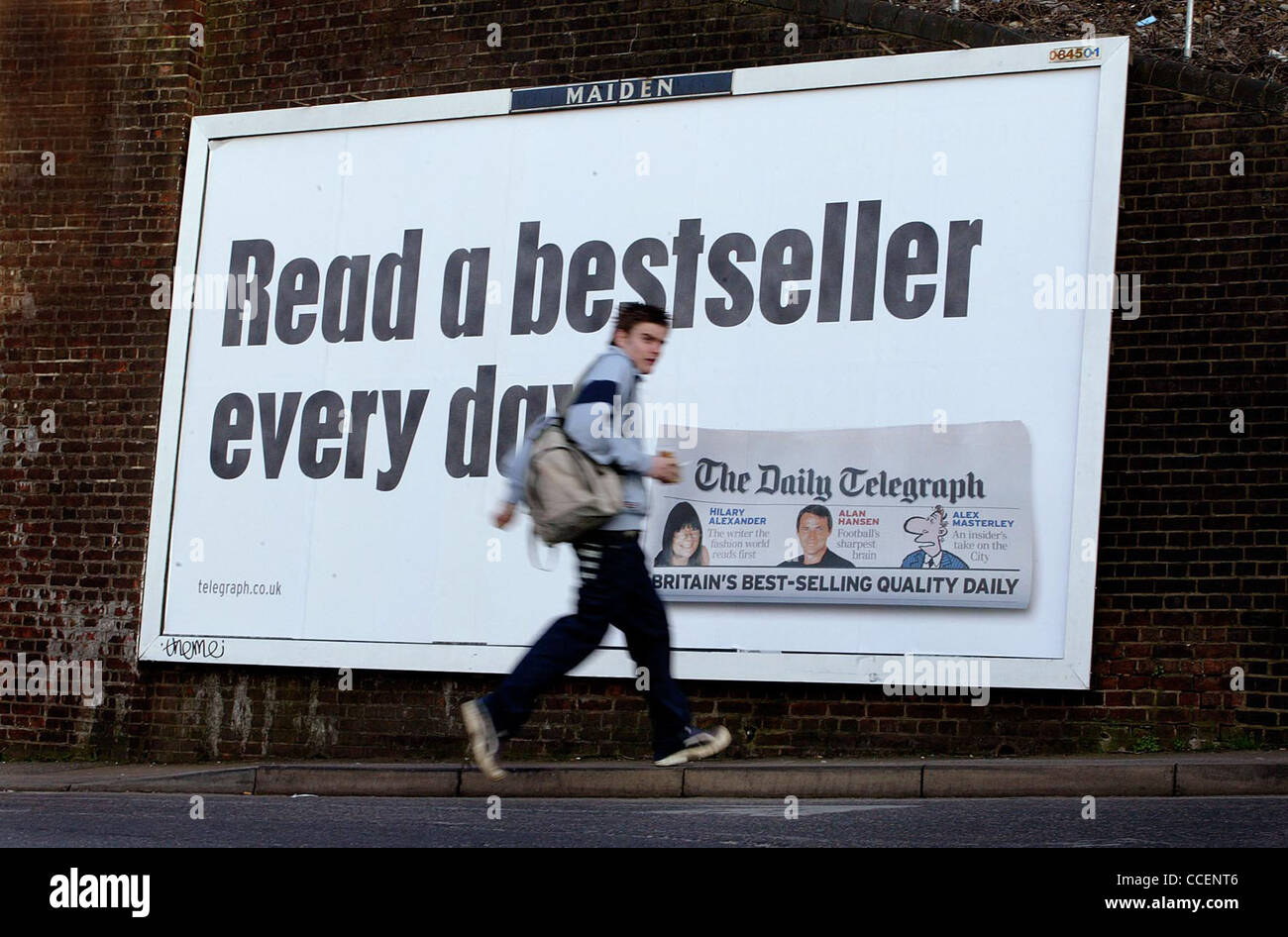 A billboard advertising The Daily Telegraph Newspaper Stock Photo - Alamy
