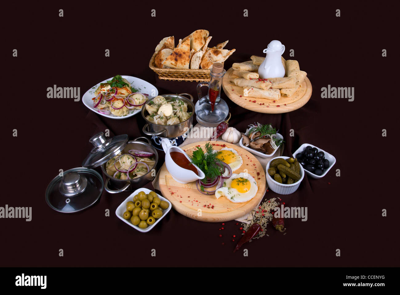 Many food dishes on the restaurant table. close up Stock Photo - Alamy