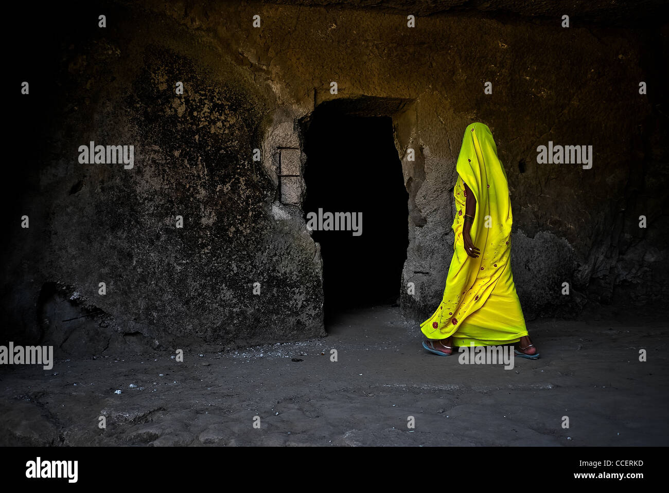 Bombay, Woman in Yellow Stock Photo - Alamy