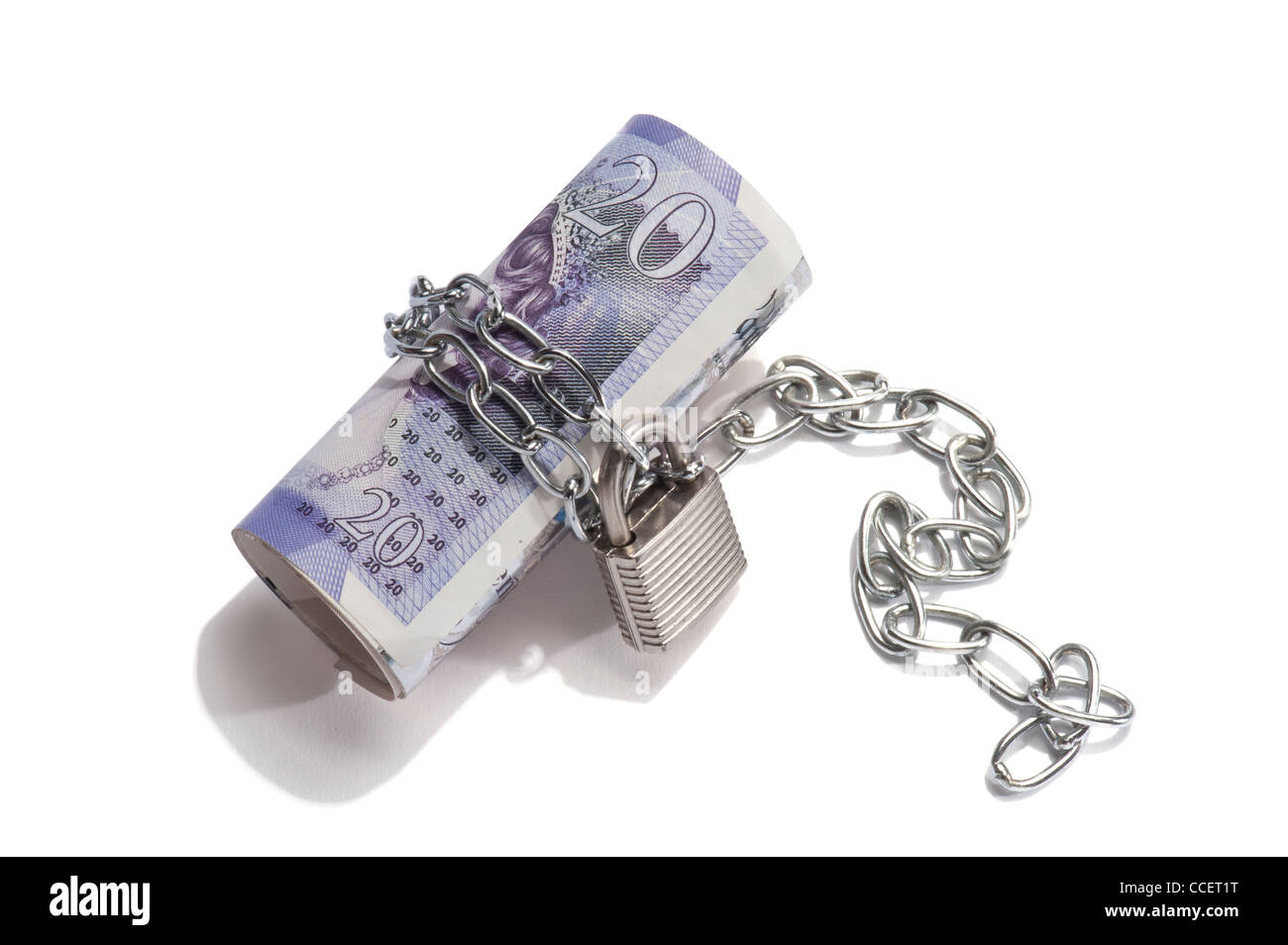 A roll of 20 British pound notes with a padlock and chain around it ...