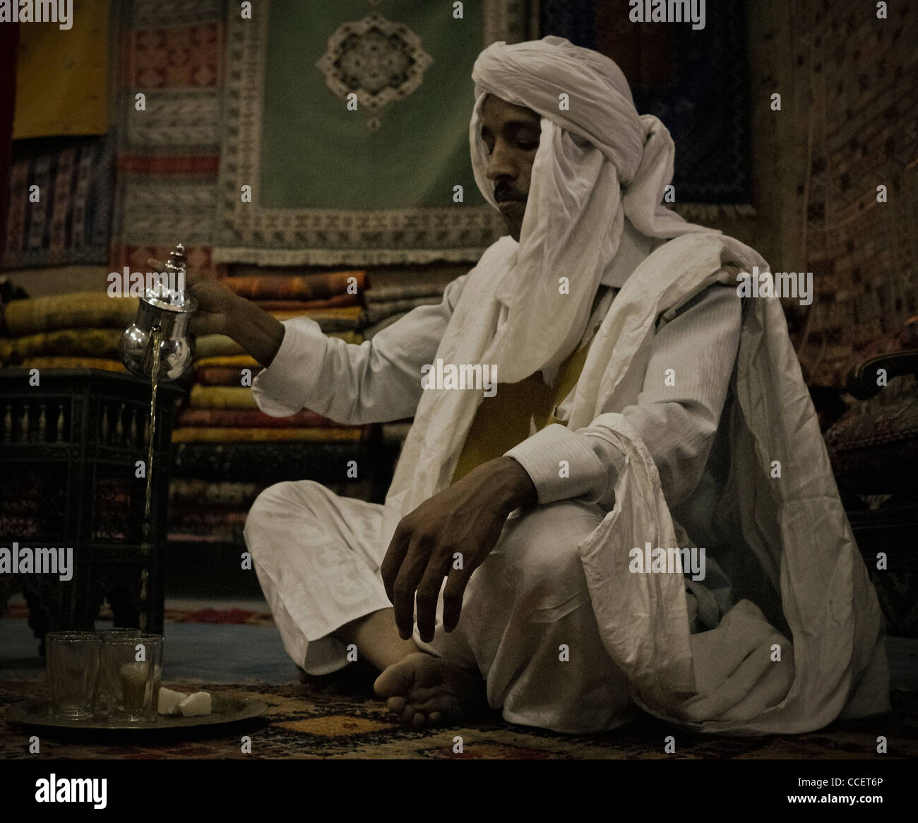 Trip in Morocco, Tea with a carpet dealer Stock Photo - Alamy