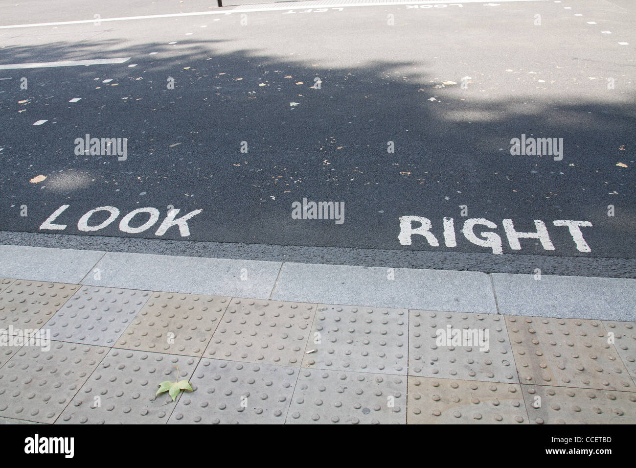 Look right notice on the road Stock Photo - Alamy