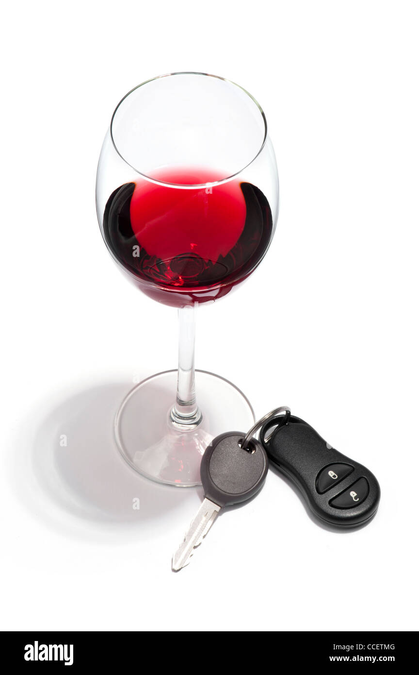 A glass of red wine and a car key Stock Photo - Alamy