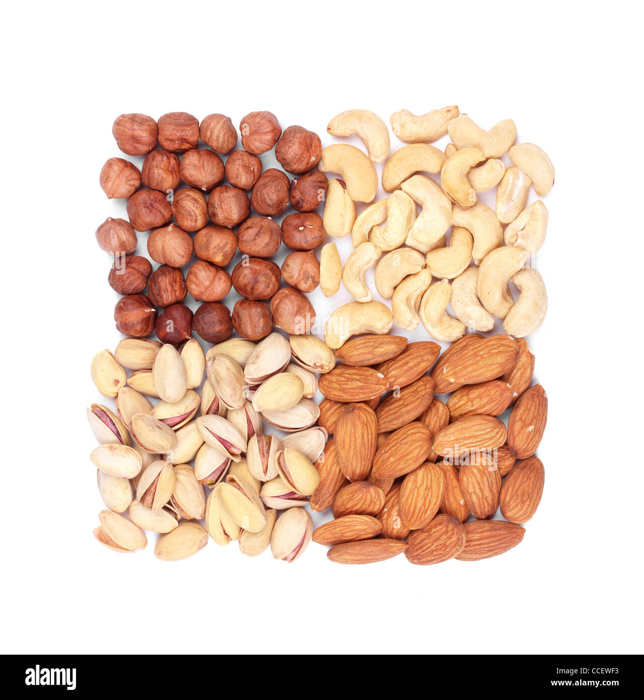 Different nuts, isolated on white Stock Photo - Alamy