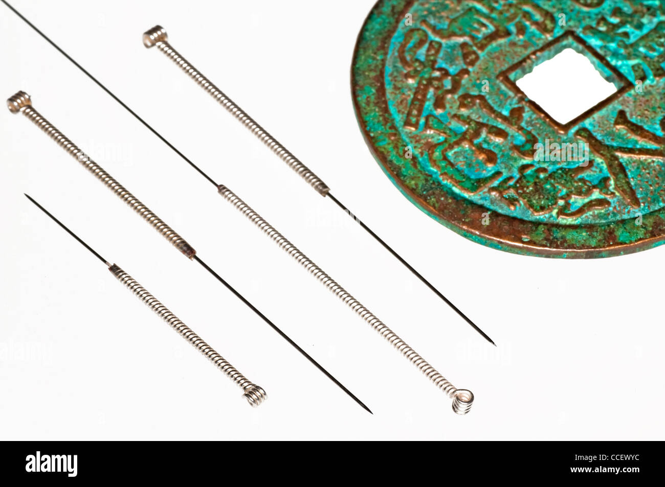 Acupuncture needles antique chinese coin hi-res stock photography and ...