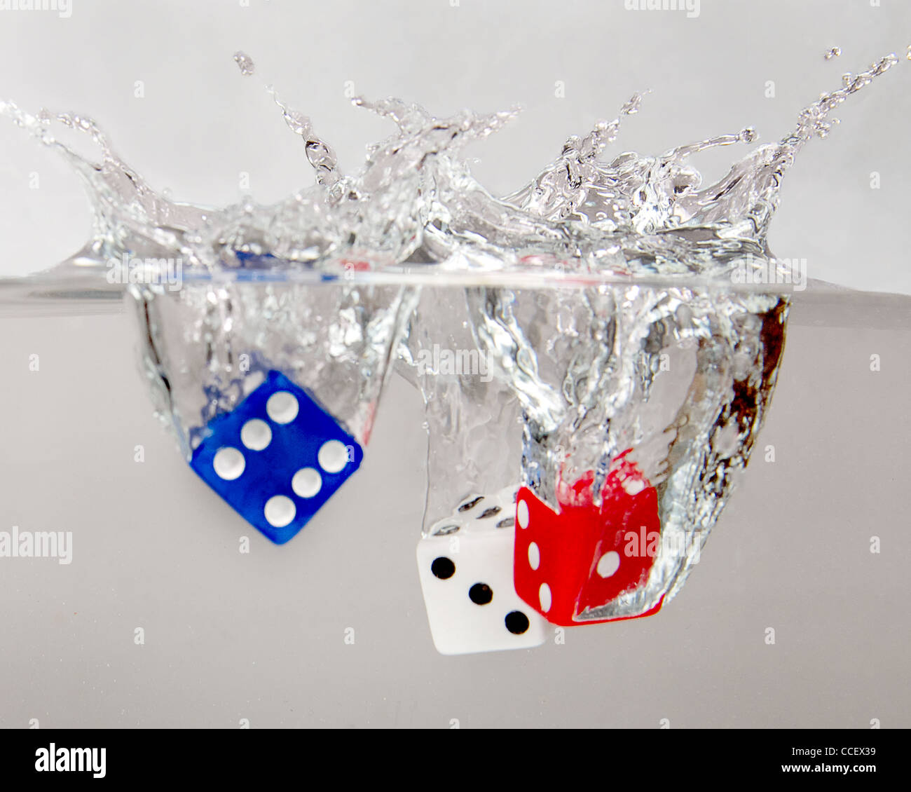 dice falling in water Stock Photo - Alamy