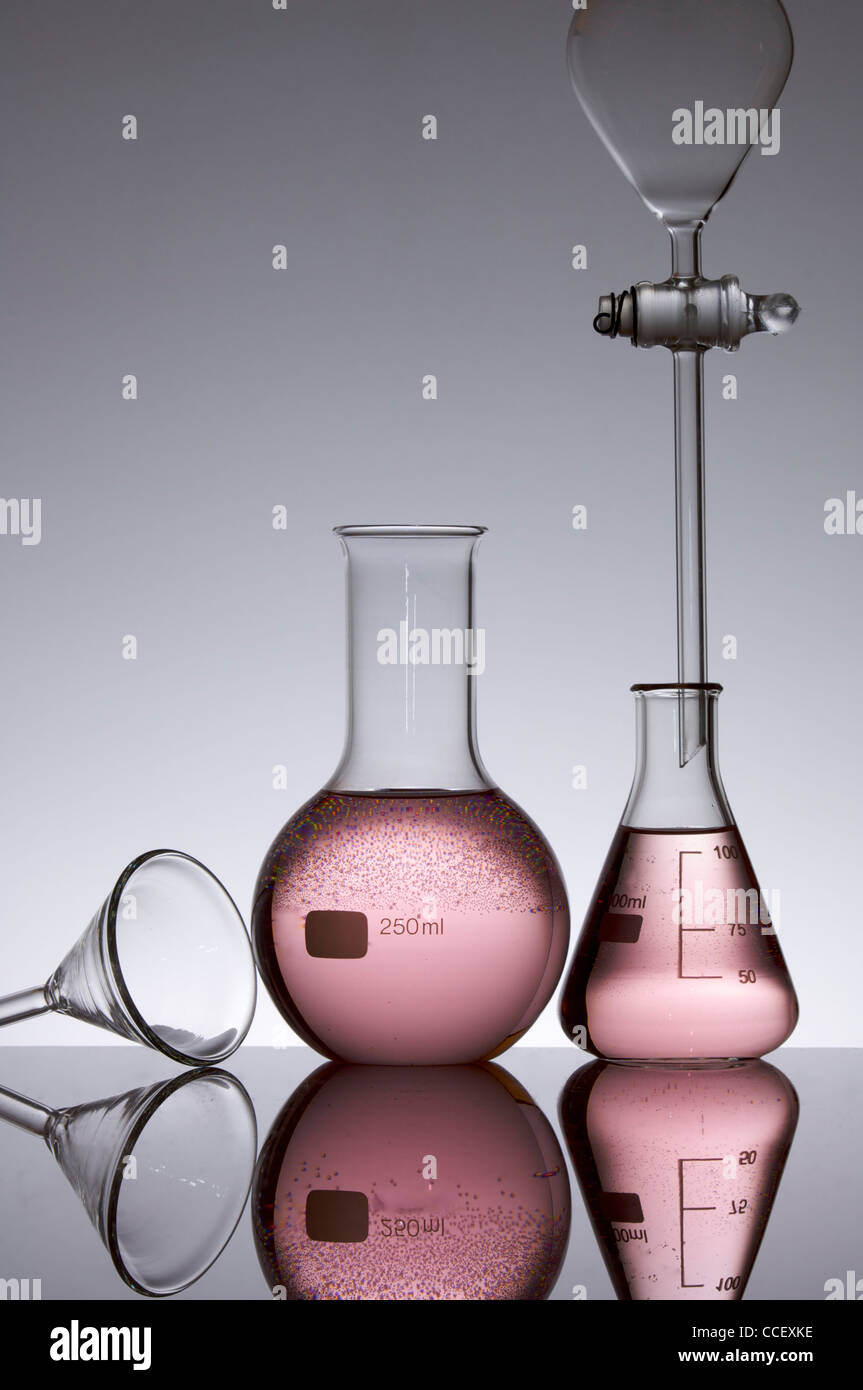 laboratory equipment with pink fluid Stock Photo - Alamy
