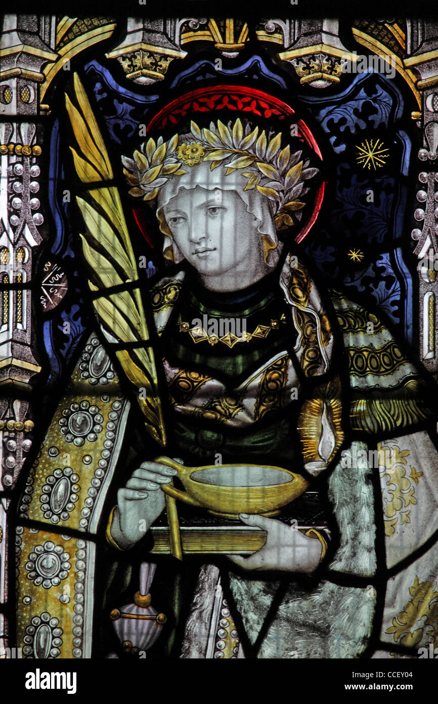 A stained glass window by C E Kempe & Co. depicting Saint Lucy, Church ...