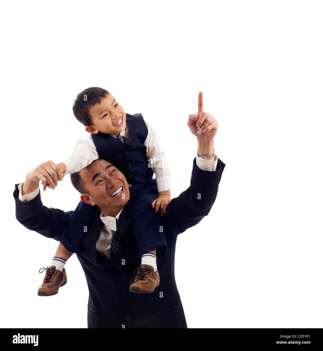 Portrait of a happy Asian Father pointing something interesting to his ...