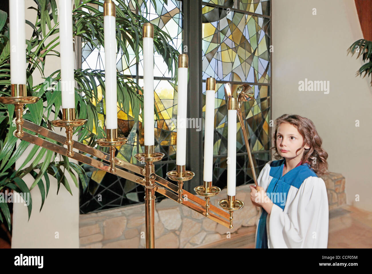 Young girl in the church Stock Photo - Alamy