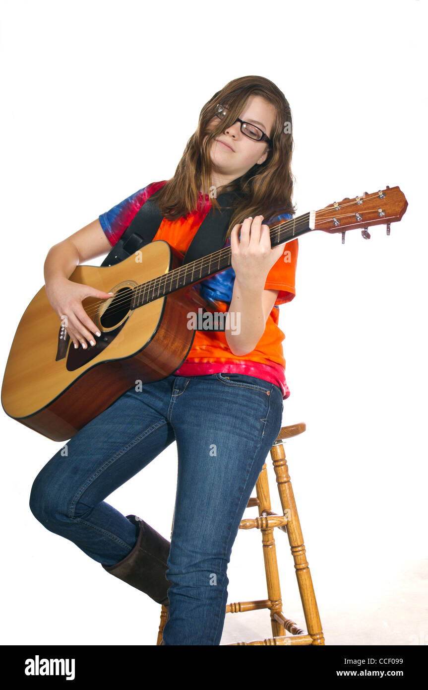 Teen Girl playing guitar Stock Photo - Alamy