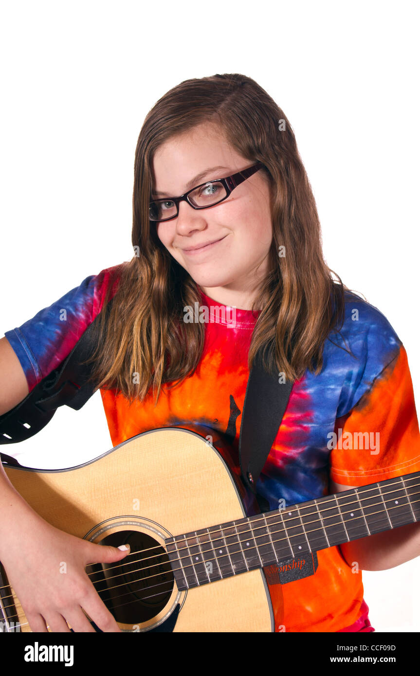 Girl playing an acoustic guitar hi-res stock photography and images - Alamy