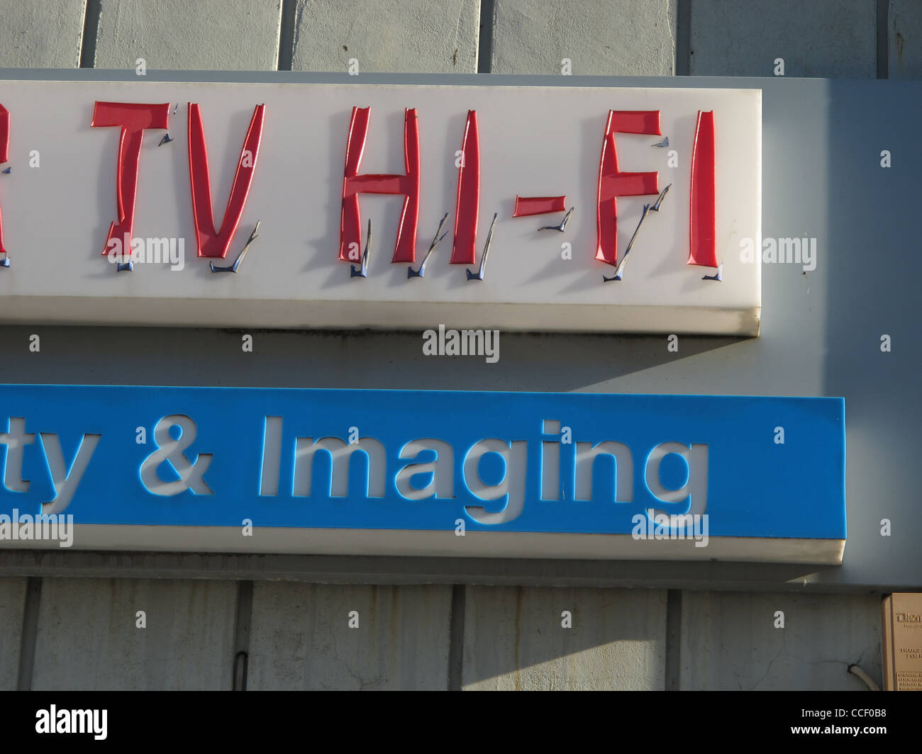 old damaged decoder tv hi fi shop sign notice Stock Photo - Alamy