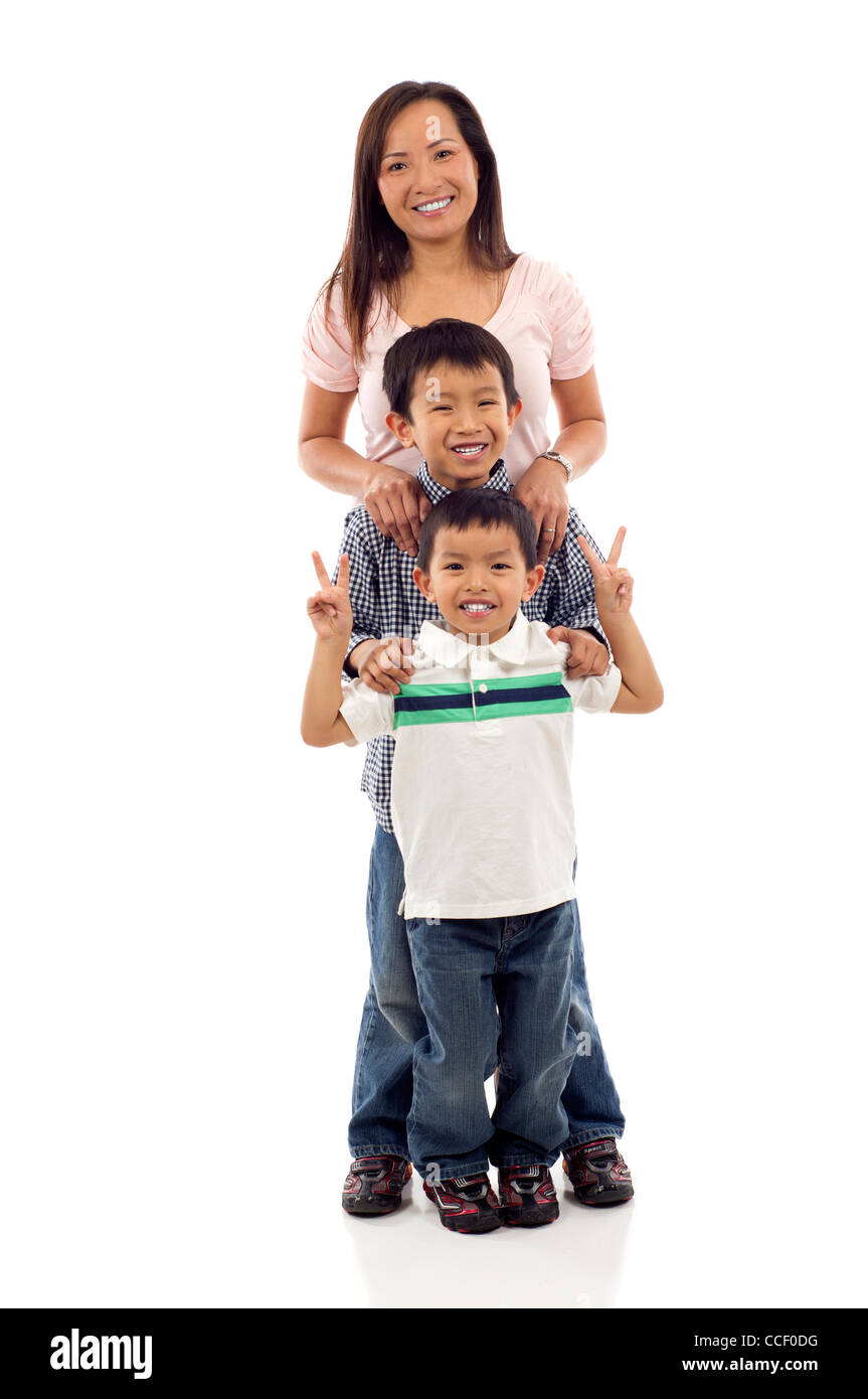Happy Family, Full length of a happy Asian mother with her two playful ...