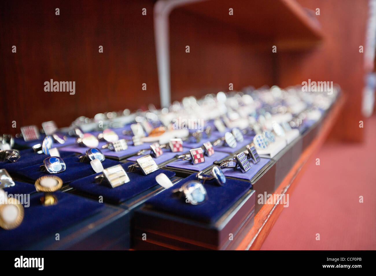 Set of hand cufflinks on display Stock Photo - Alamy