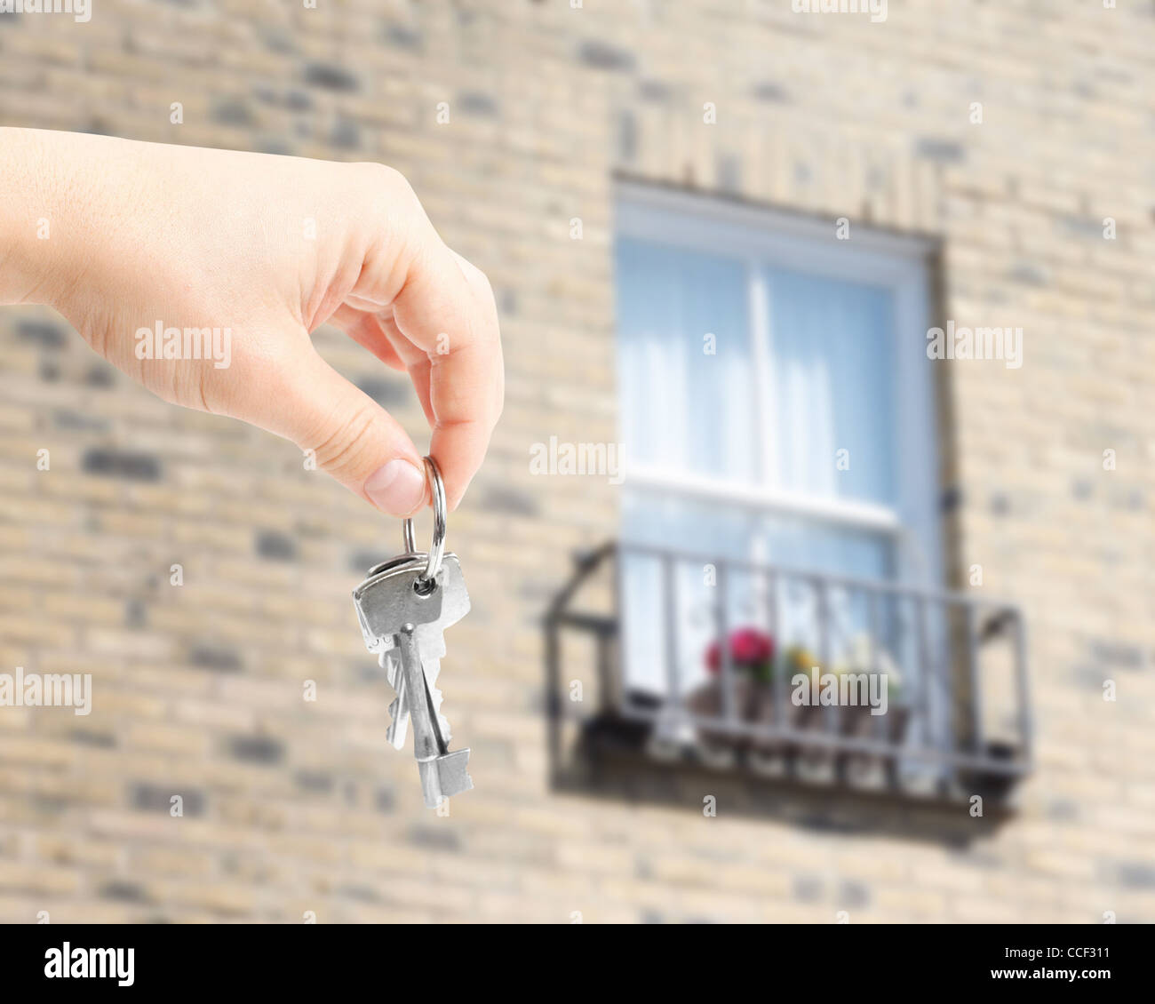 Handing over key Stock Photo - Alamy