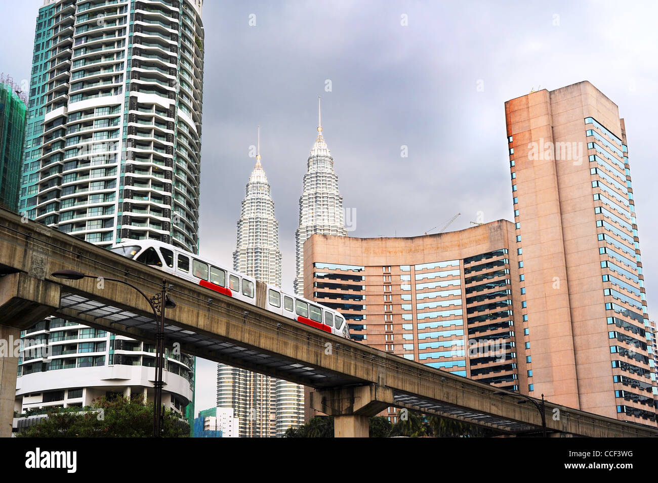 Cityscape with metro and high office buildings in Kuala Lumpur ...