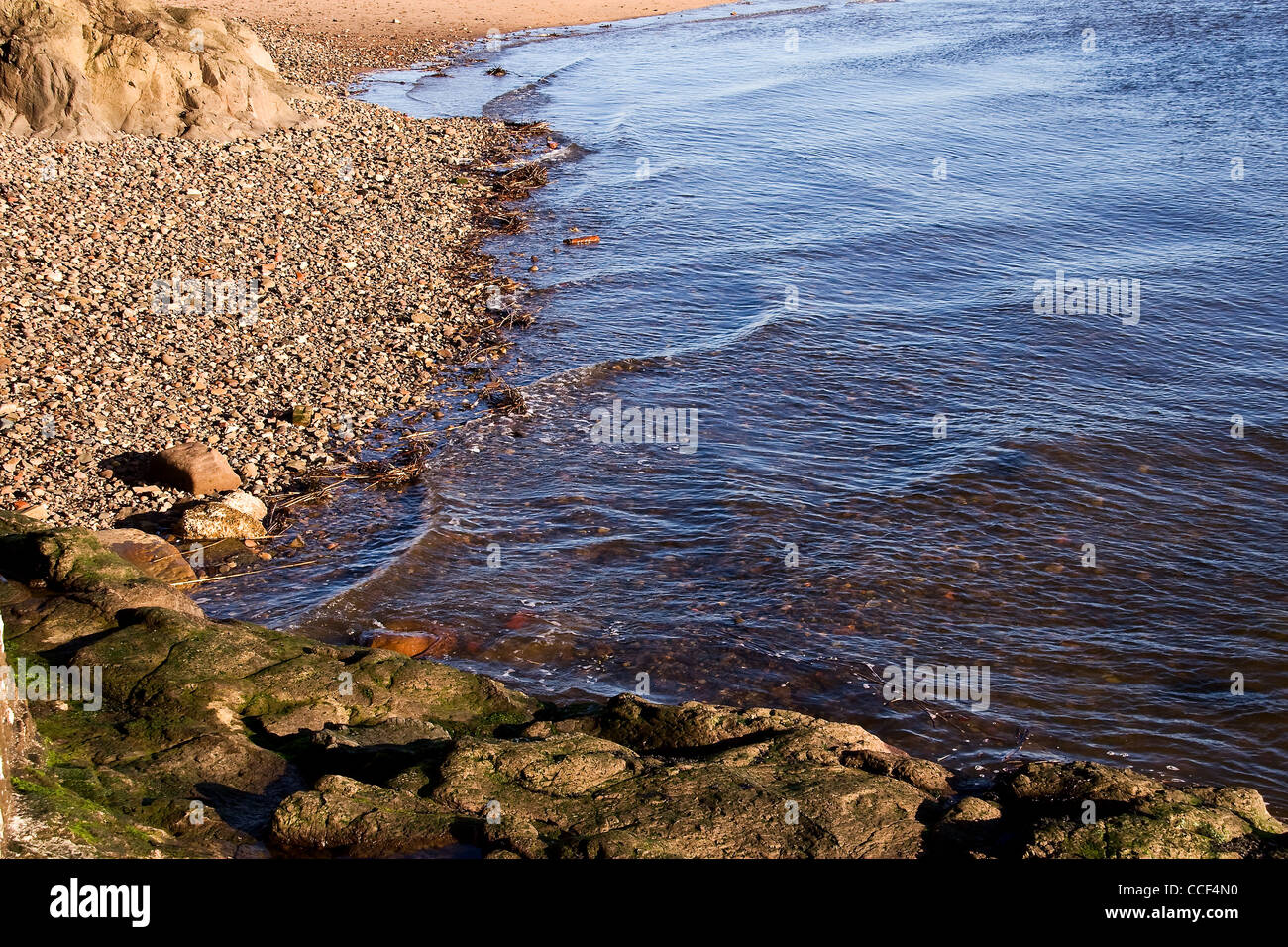 Slow tide on the River Tay coming in on the Broughty Ferry Beach in ...