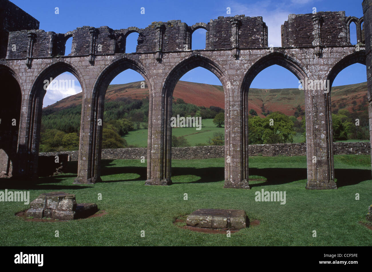 Llanthony Priory Nave arches and Hatterall Ridge hill in background in ...
