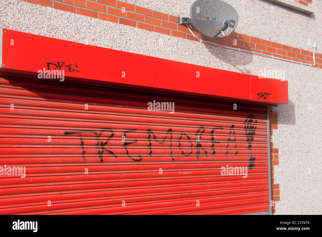 'Tremorfa!' graffiti on red shop shutter in Splott Cardiff Wales UK ...
