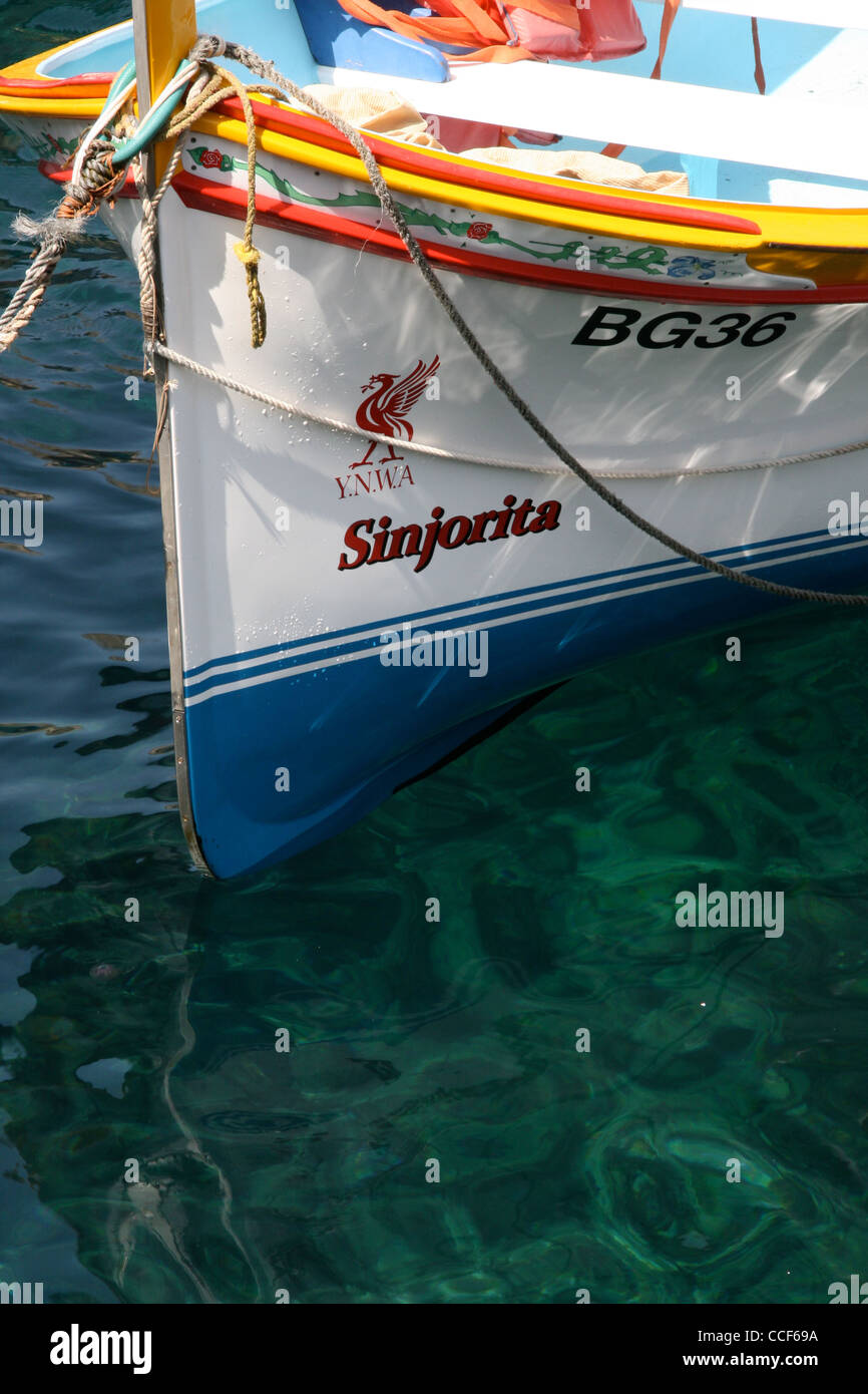 Luzzu boat at the blue grotto in Malta Stock Photo - Alamy