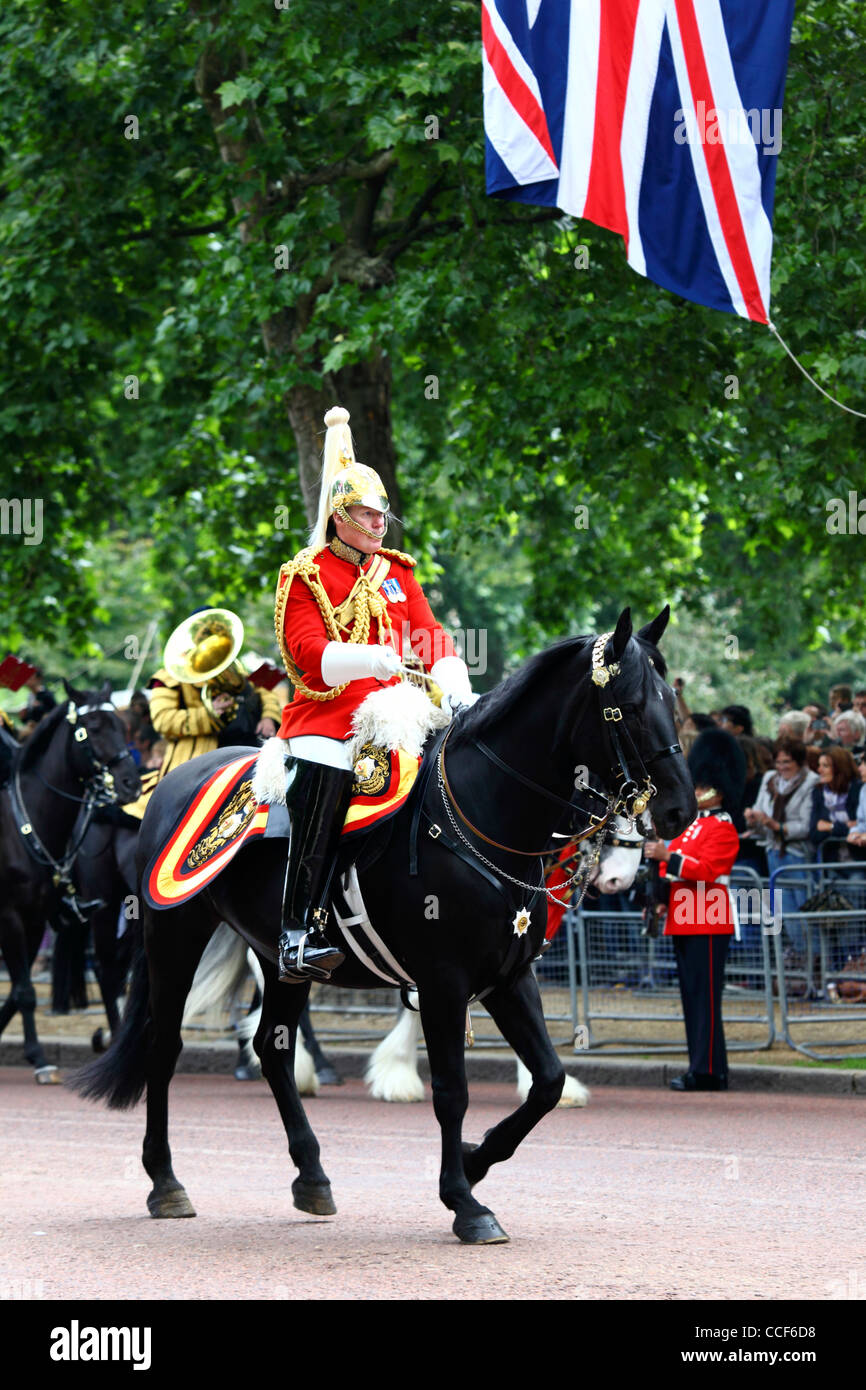 Household Cavalry Life Guard officer passing along Pall Mall during ...