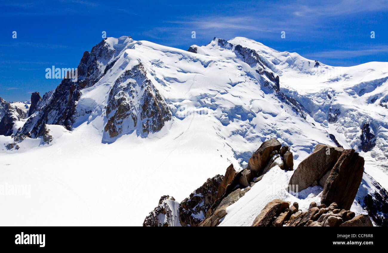 View of the aiguilles and snow capped peaks near the summit of Mont ...