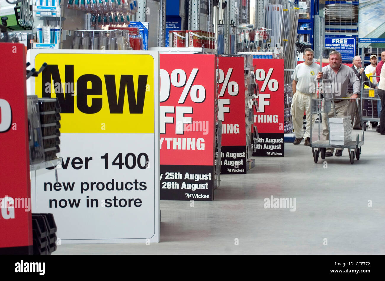 Discount signs in the aisle of the Wickes Extra DIY superstore in ...