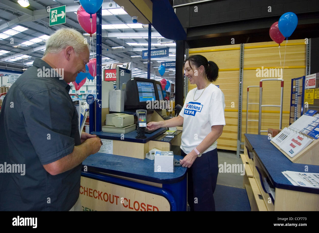 The checkout at the Wickes Extra DIY superstore in Swansea, UK Stock ...