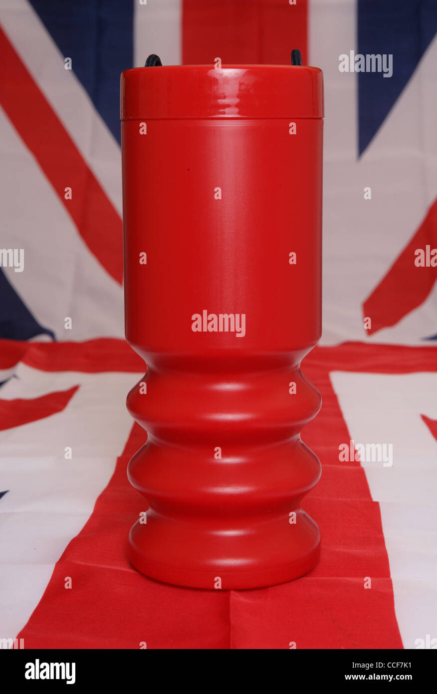 Red charity collection on union jack flag Stock Photo - Alamy