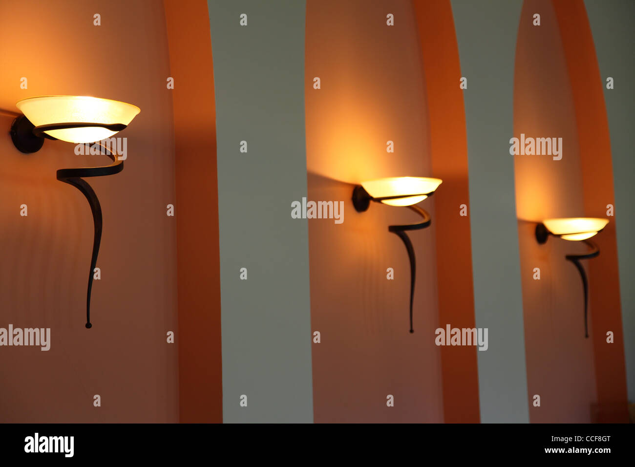 elegant wall lamp, light orange Stock Photo - Alamy