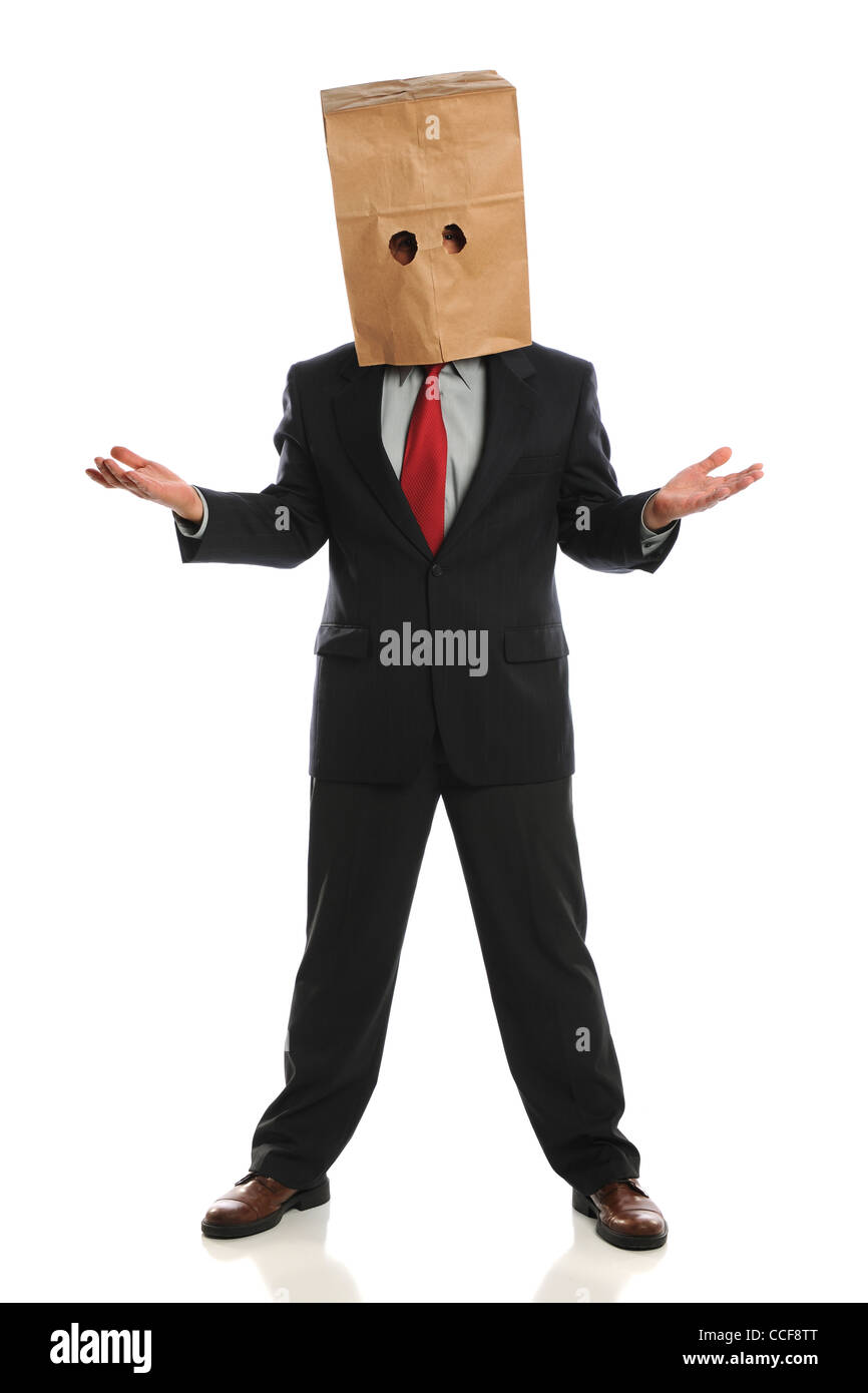 Portrait of businessman wearing paper bag over head isolated over white ...