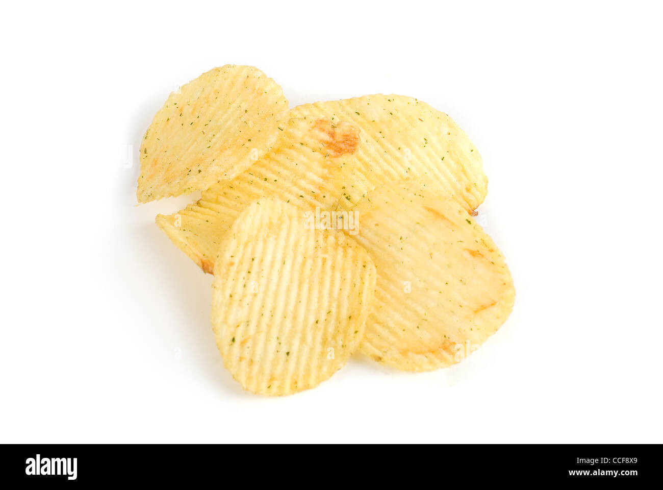 Potato chips close up isolated on a white background Stock Photo - Alamy