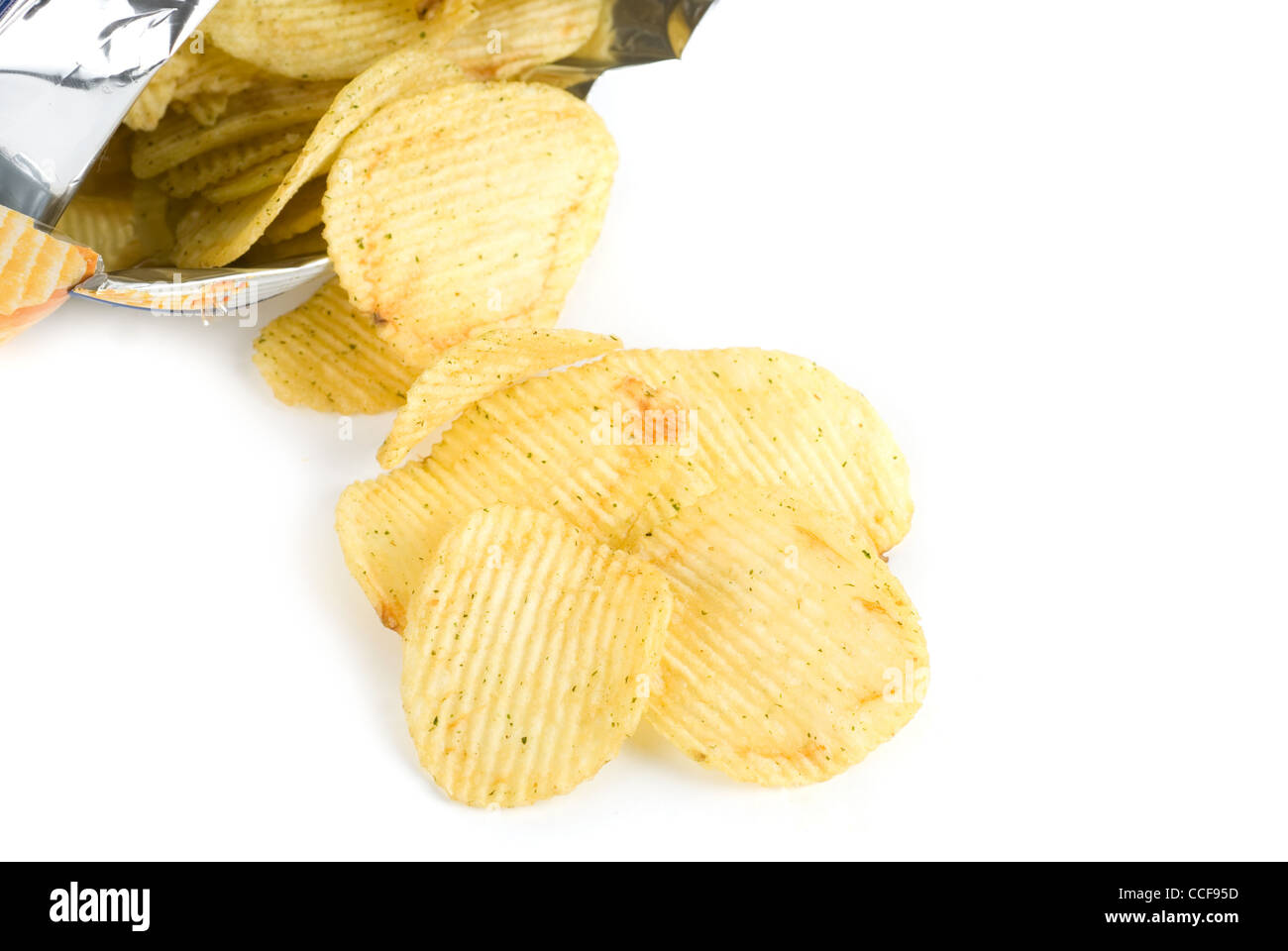 Potato chips close up isolated on a white background Stock Photo - Alamy