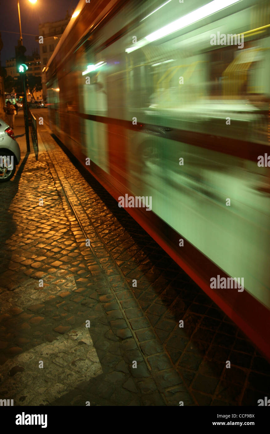 fast metro tram carriage on tracks in city at night rome italy Stock ...