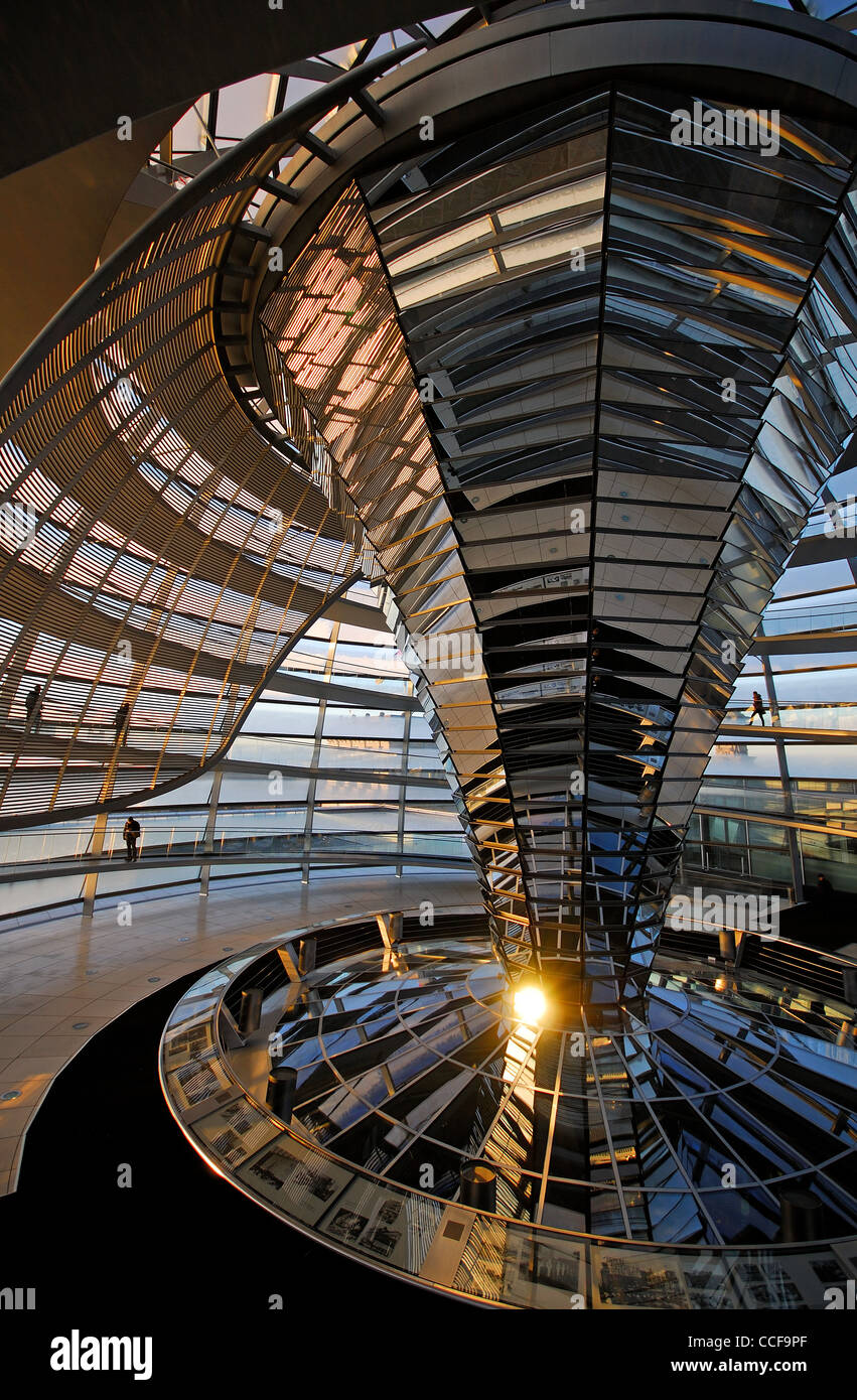 BERLIN, GERMANY. The rising sun reflected in mirrored panels in the ...