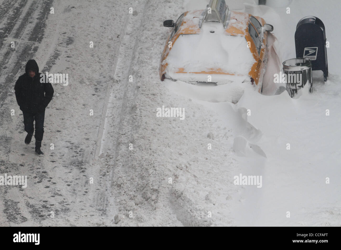 Cars trying to get around in the snow, MTA Buses stock in the middle of ...