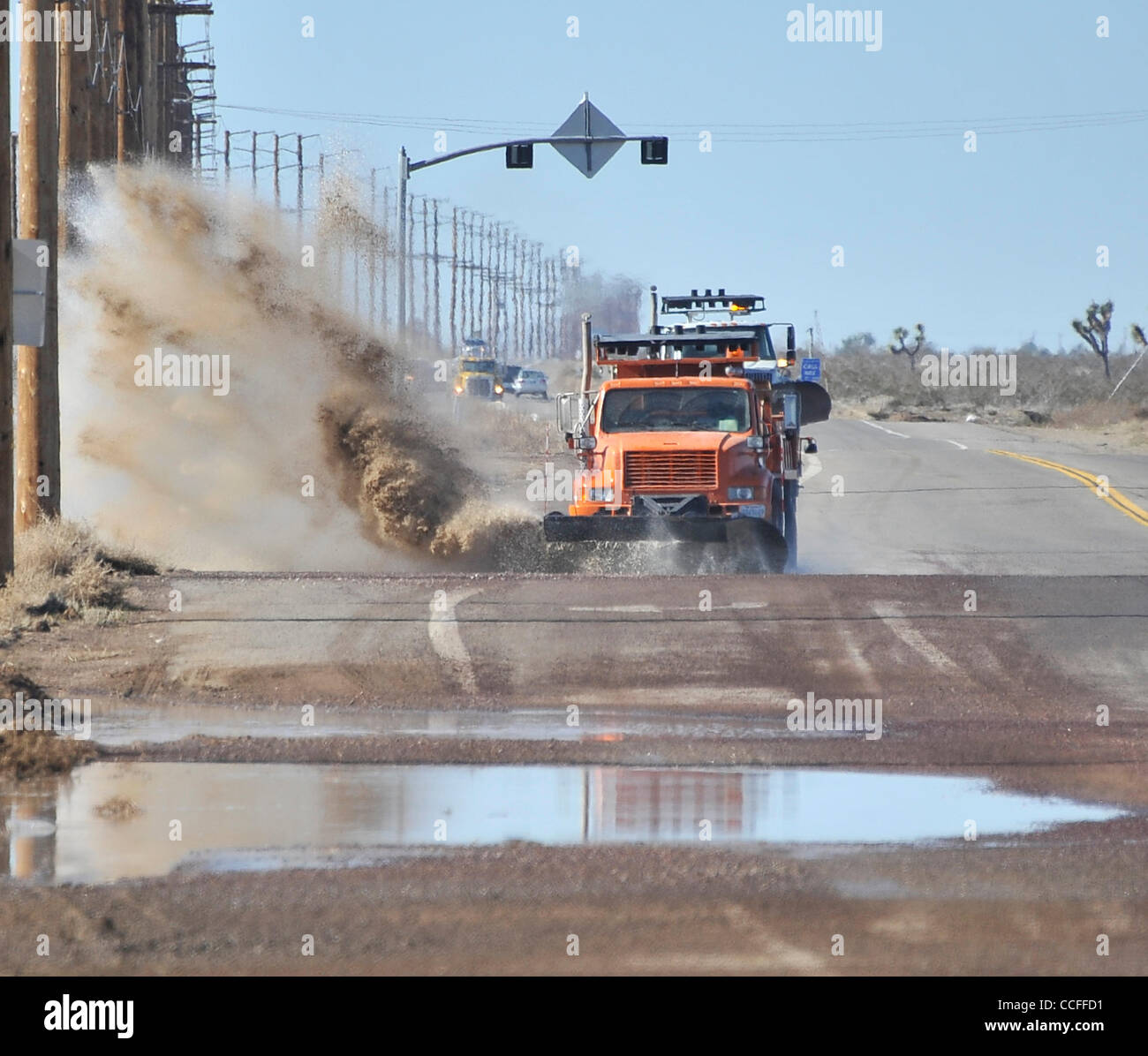 Cal Trans uses their snow plows to remove the melting snow that is ...