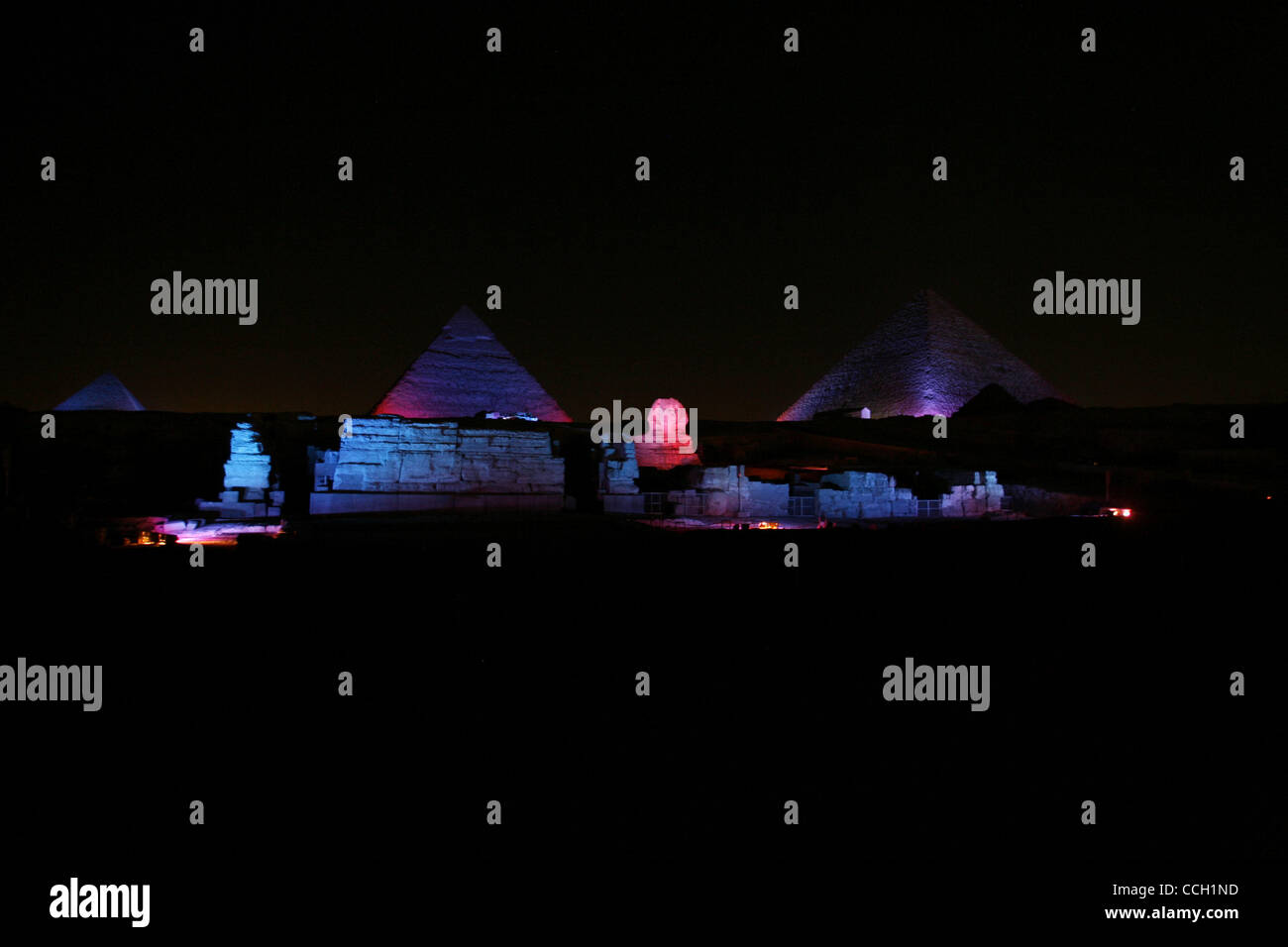 Pyramids and a sphinx at night in giza hi-res stock photography and ...