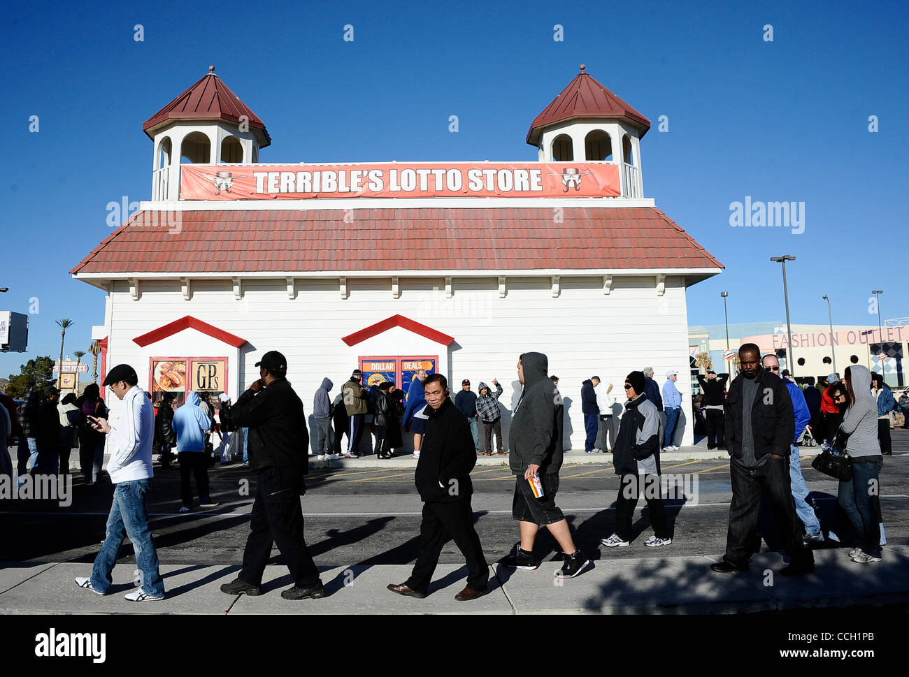 Jan 4,2011 - Primm, Nevada, USA. Hundreds of people waited in line up ...