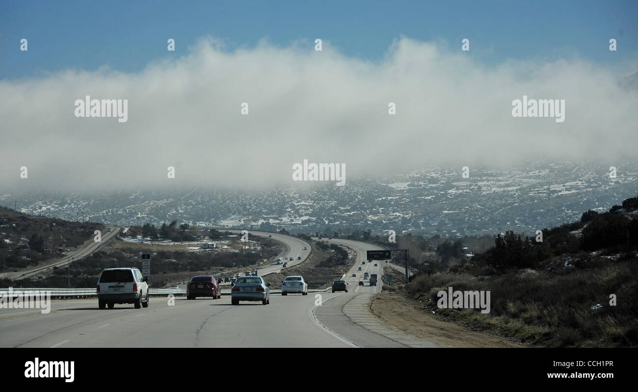 Drivers have clear weather along the 14 freeway after a winter snow ...