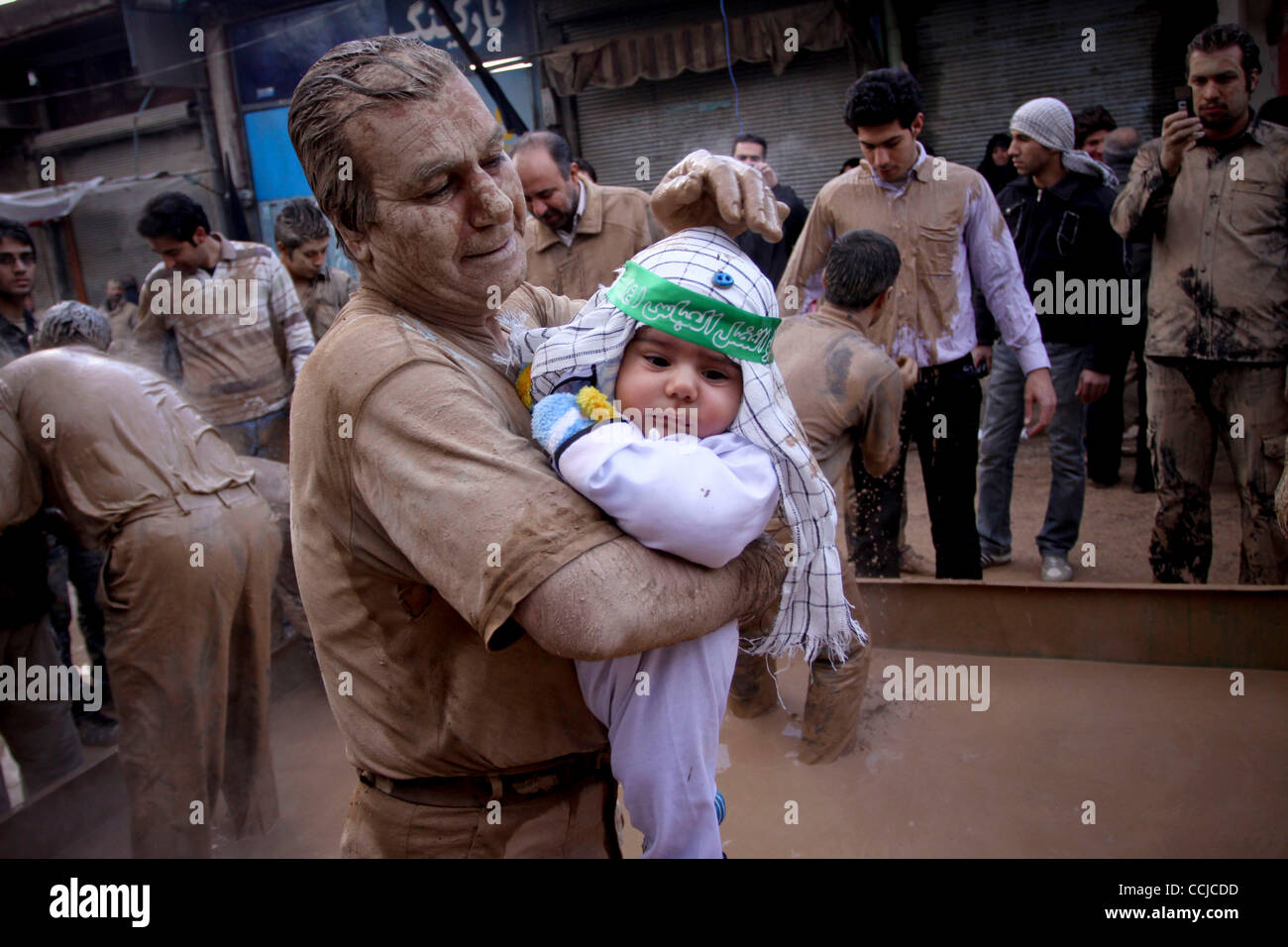 12-16-2010: Mournful people cover themselves in mud during “Gel Oftan ...