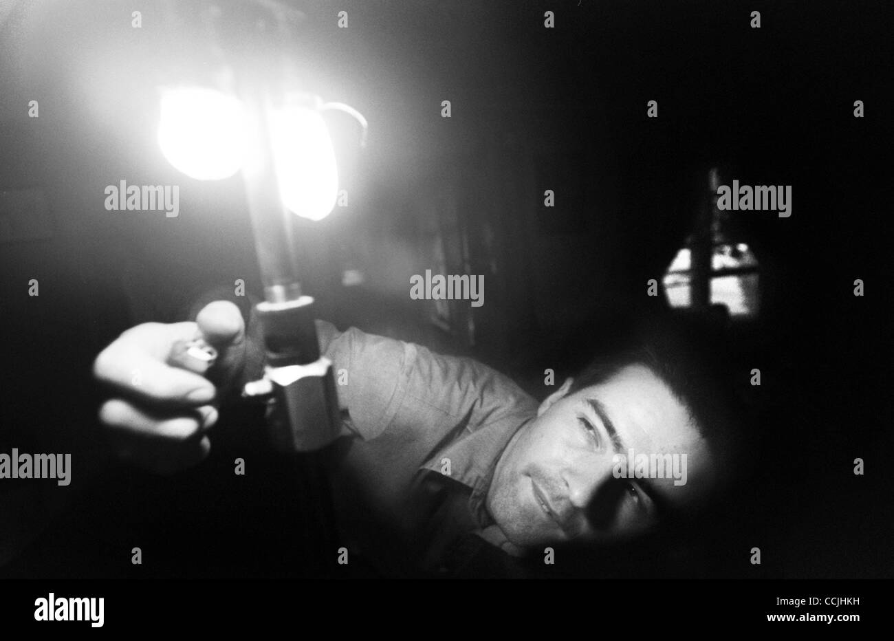 Jul. 22, 2003 - Arthur, Illinois, U.S. - DANIEL HELMUTH lights a ...