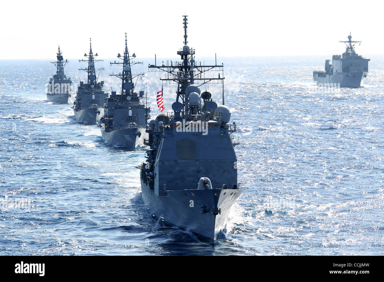 Dec. 10, 2010 - Pacific Ocean, Japan - U.S. and Japanese ships follow ...